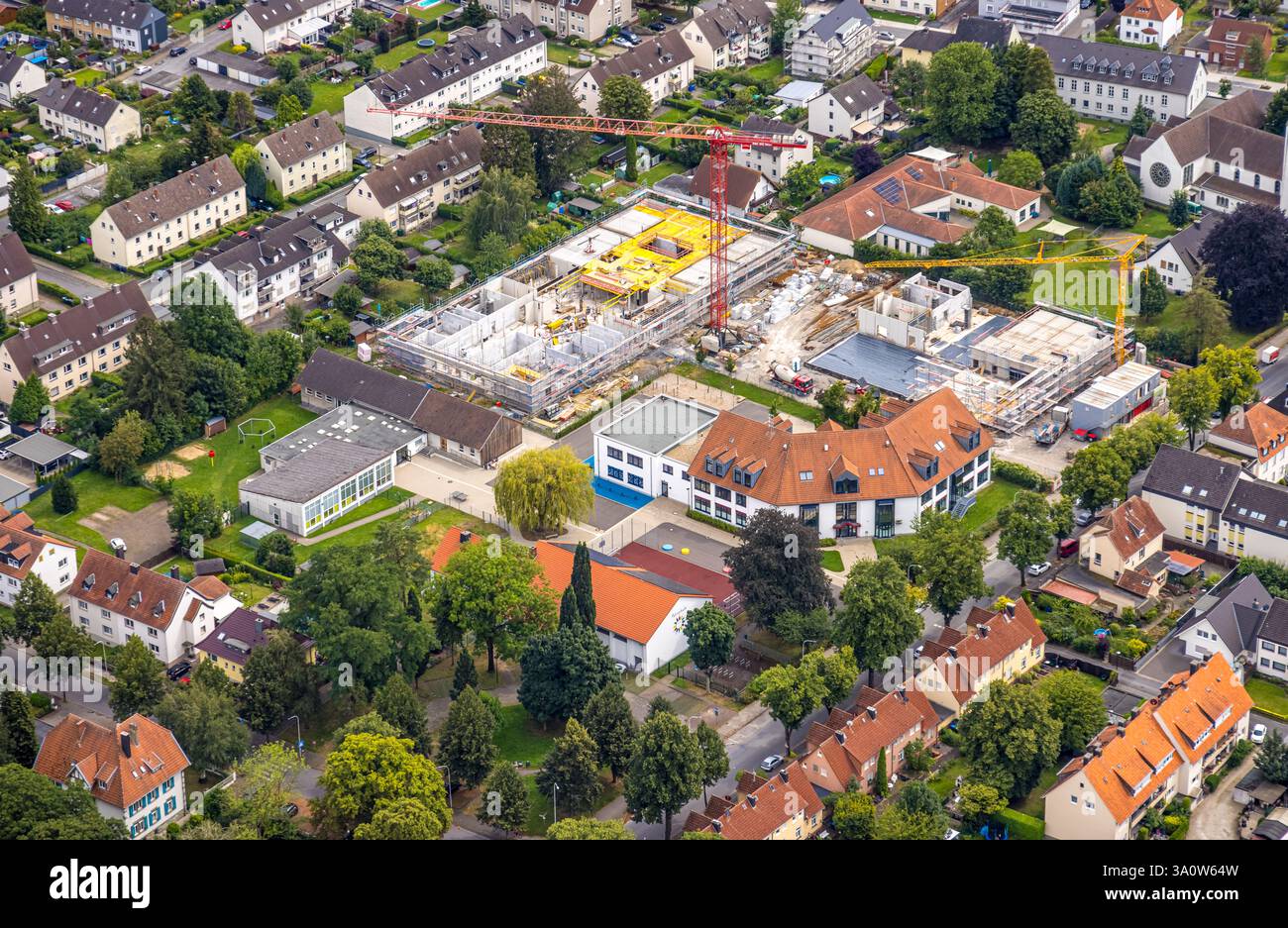 Aerial view, construction site with construction crane and new school ...