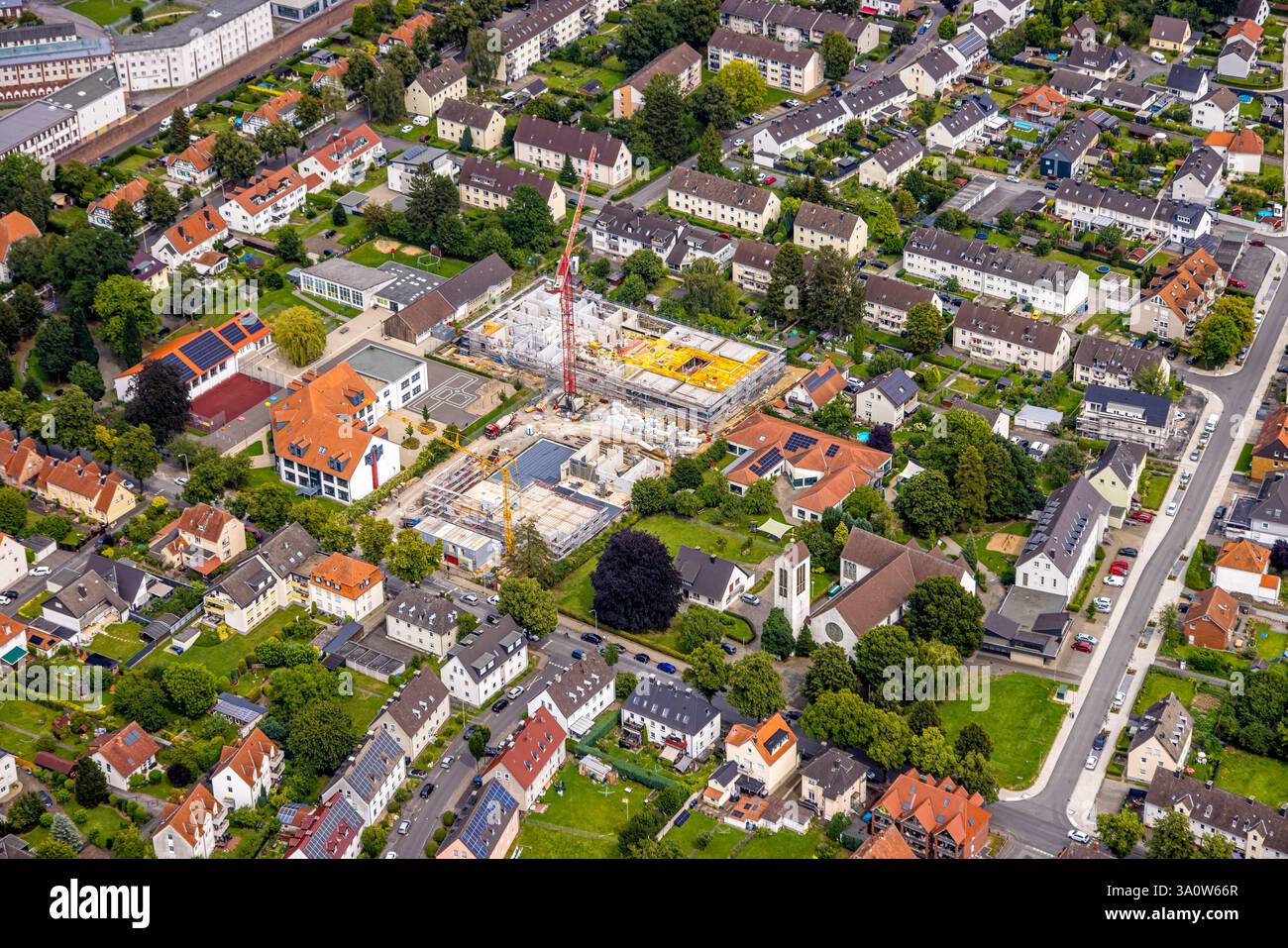 Aerial view, construction site with construction crane and new school ...