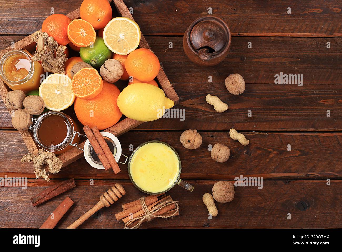 Healthy natural food for flu and colds. Golden turmeric latte and fresh ...