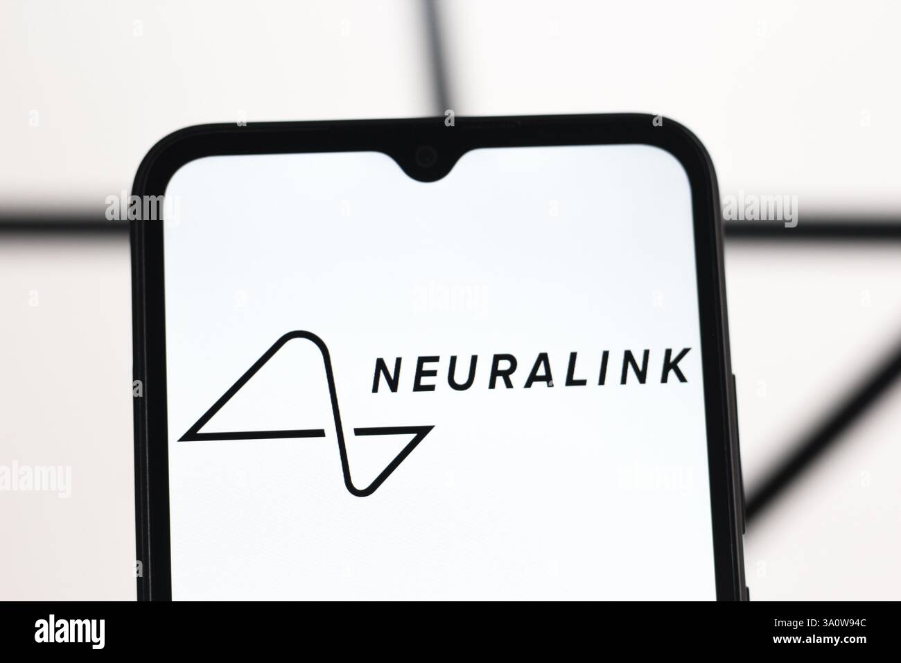 In this photo illustration, the Neuralink logo is seen displayed on a ...