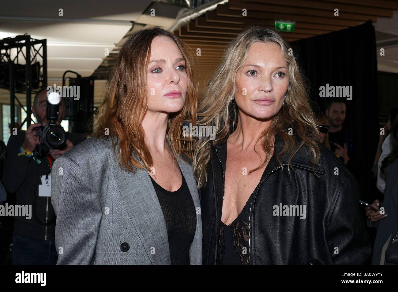 Designer Stella McCartney, left, and Kate Moss backstage after the ...