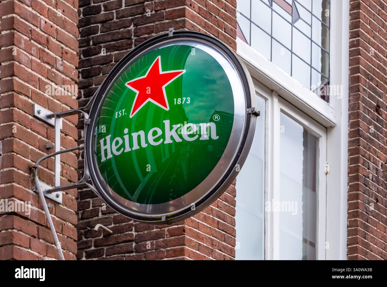 Meppel, Netherlands, 6.9.2024- Shinny logo of the brand "Heineken"on a ...