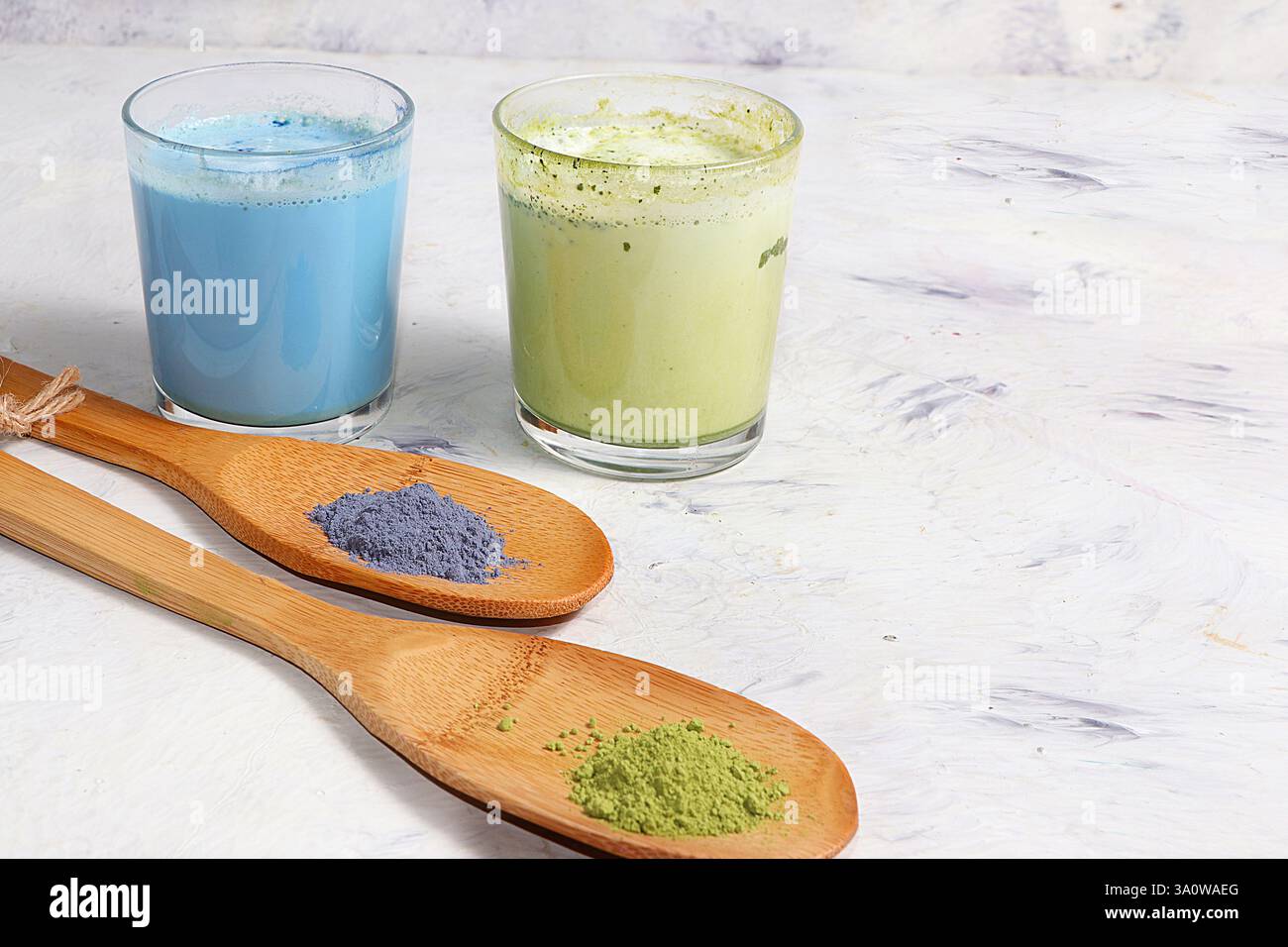 An assortment of colorful latte Japanese tea, match blue and green. A ...