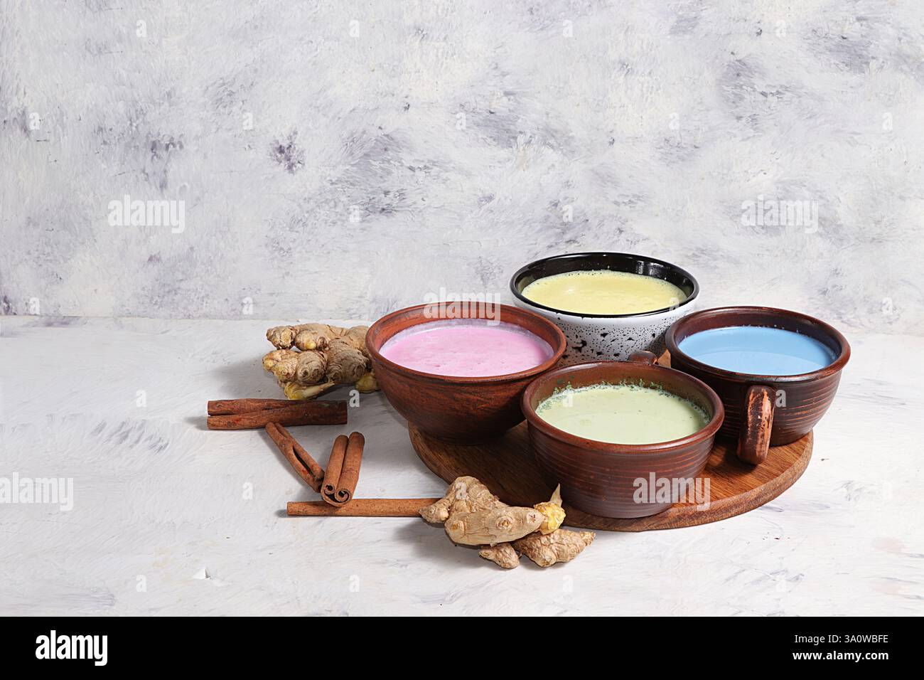 An assortment of colorful latte Japanese tea, golden turmeric, matcha ...
