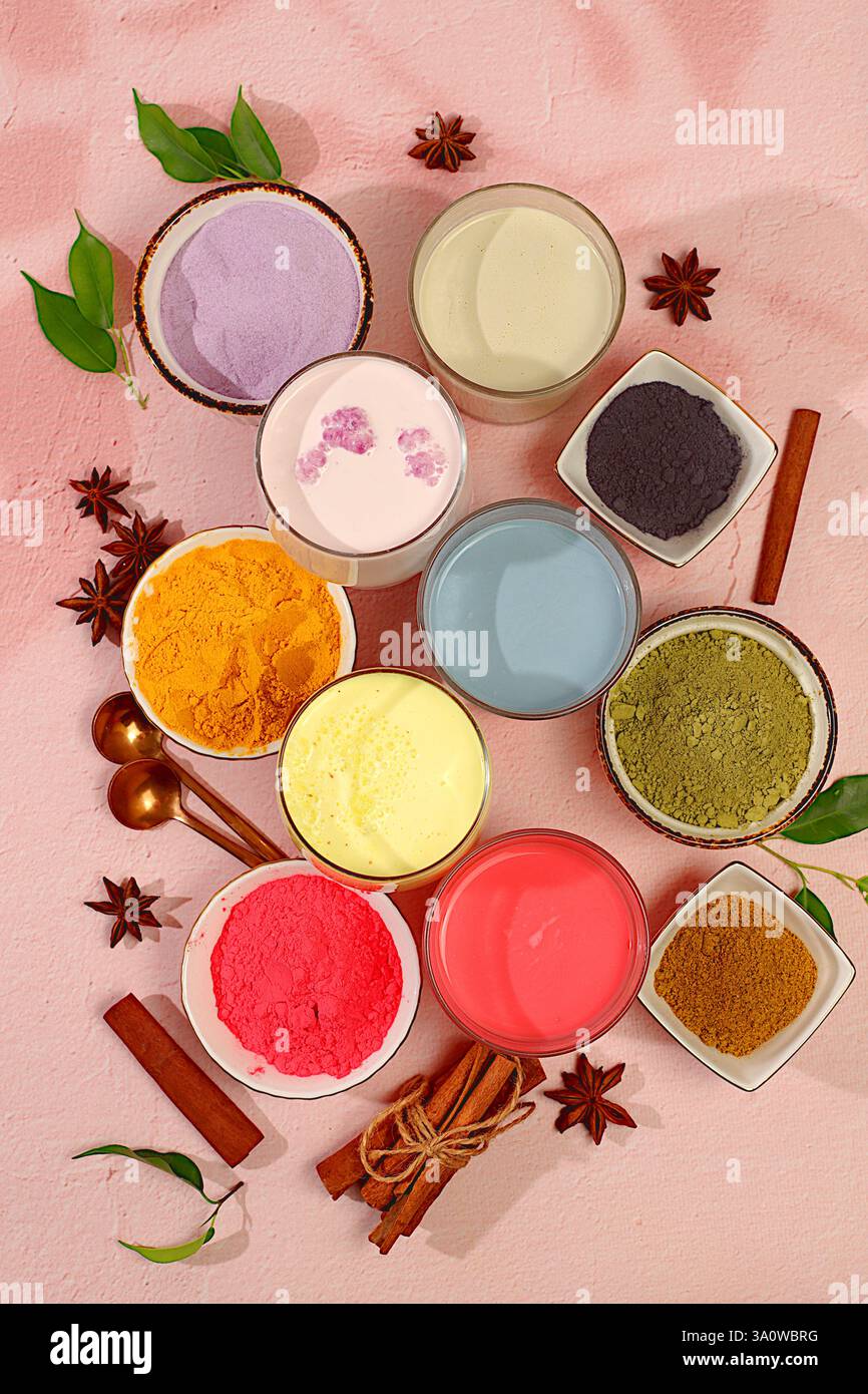 Various matcha tea lattes with milk on light background and matcha ...