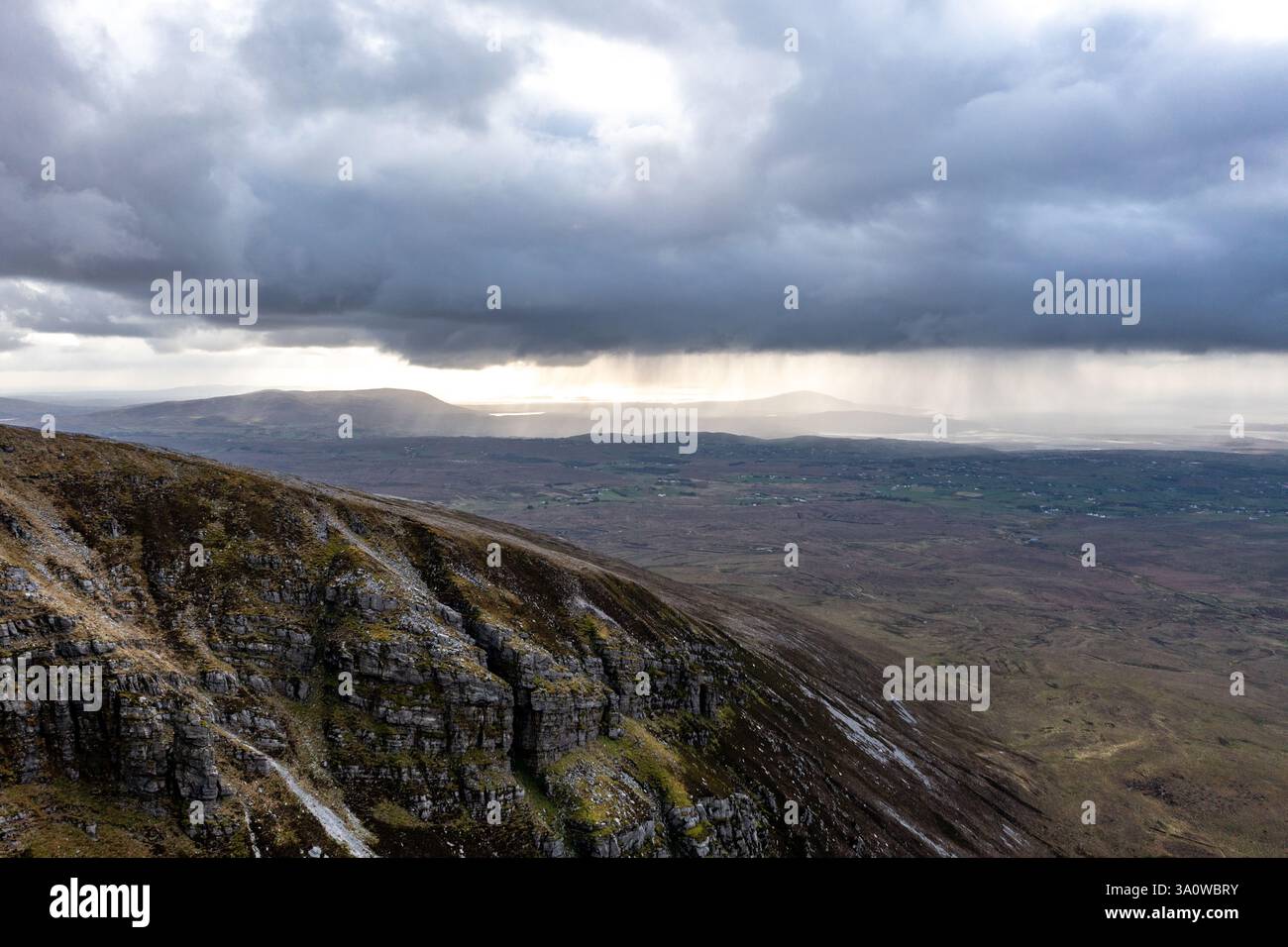 Aerial view of the Muckish mountain and the trail called miners path in ...