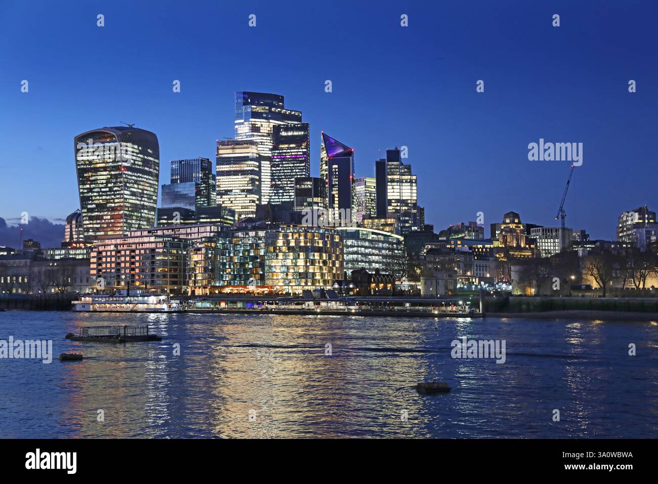 City of London skyline and River Thames at dusk - February 2025. View ...