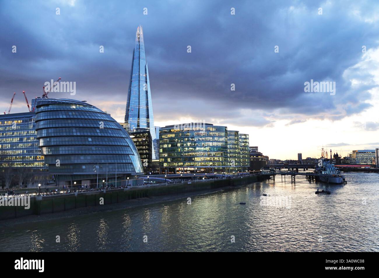Dusk view of the More London office development by the River Thames ...
