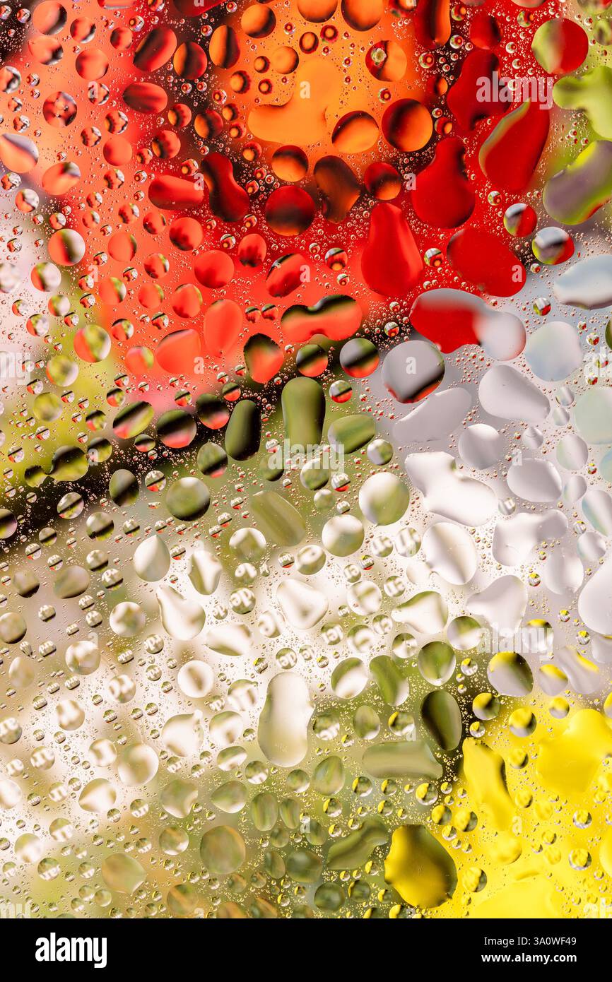 Very close up arresting, ethereal, colour infused refraction in water ...