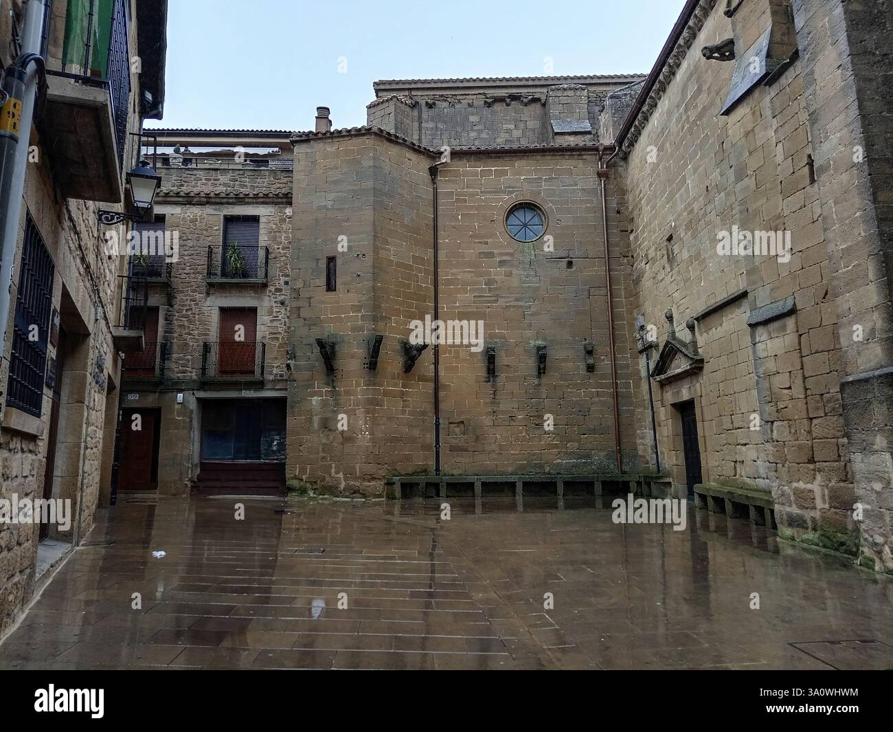 Wet cobblestone street in the medieval town of Laguardia, Alava, Spain ...