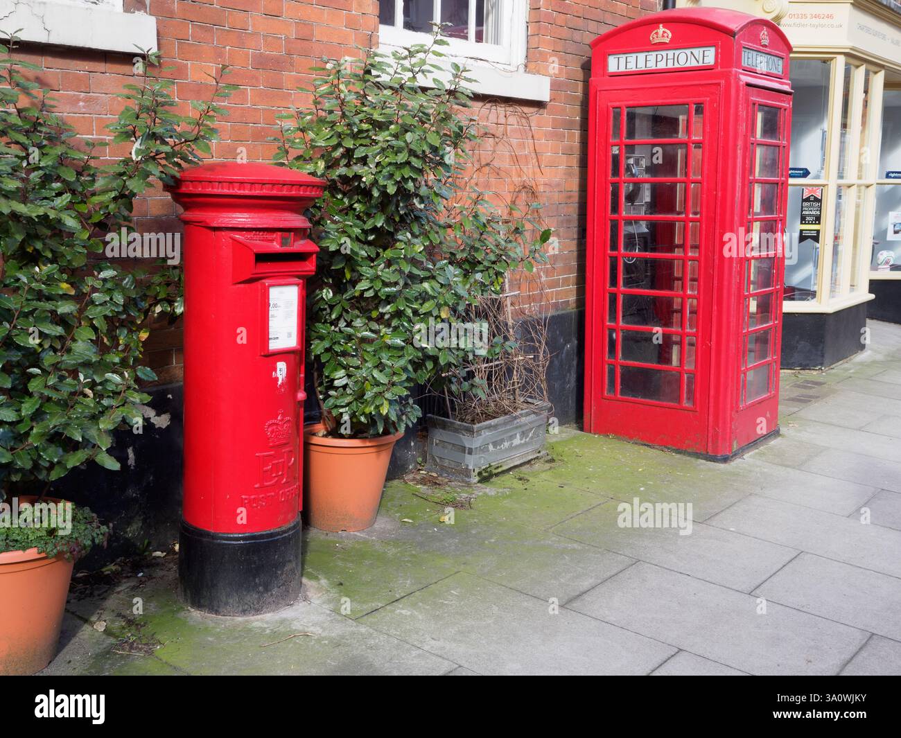 Post box and telephone kiosk in Ashbourne Stock Photo - Alamy