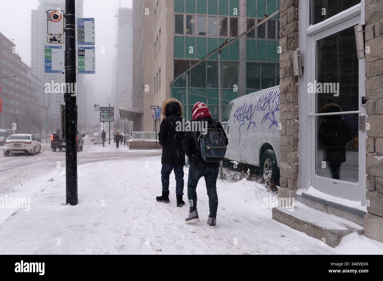 Montreal, Canada - January 10th 2025 - Pedestrians try to navigate ...