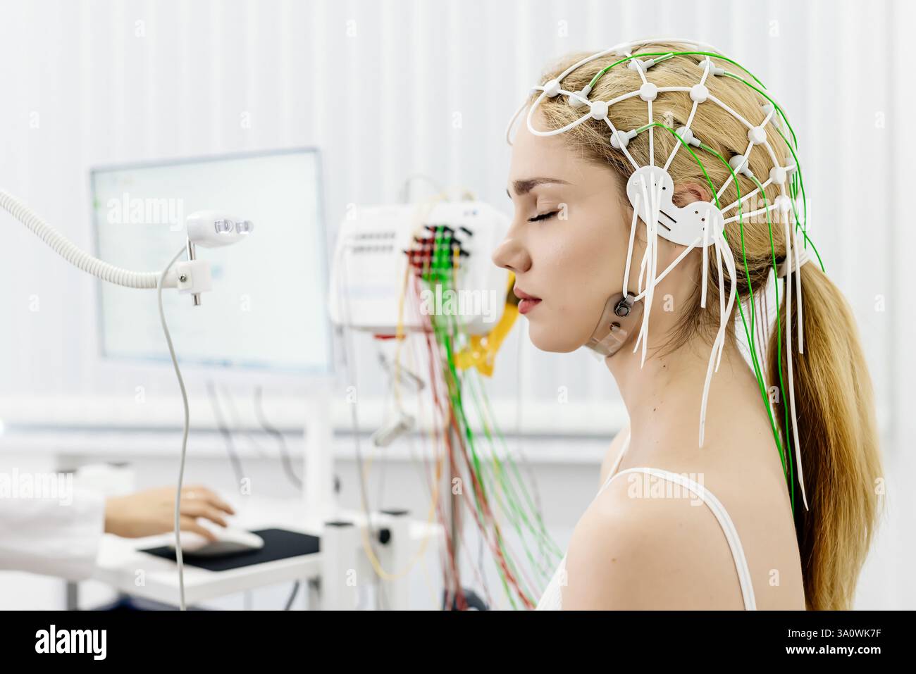 The patient is preparing for a brain activity scan. Ideal for ...