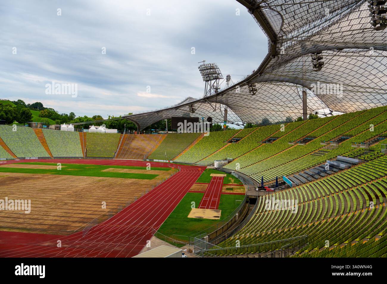 Modern renovated large stadium venue with running track and seating ...