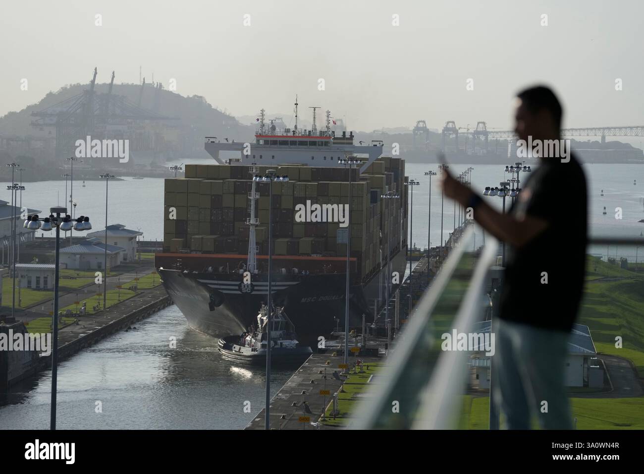 FILE - A cargo ship goes through the Panama Canal's Cocoli locks in ...