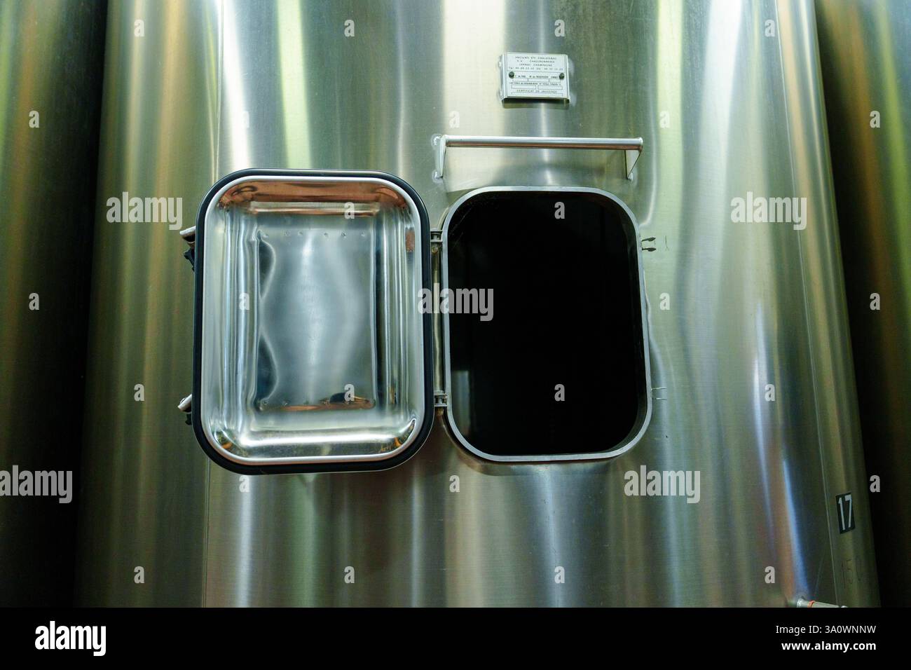 Opened Hatch of a Large Metal Tank or Vat with Shiny Steel Surface and ...