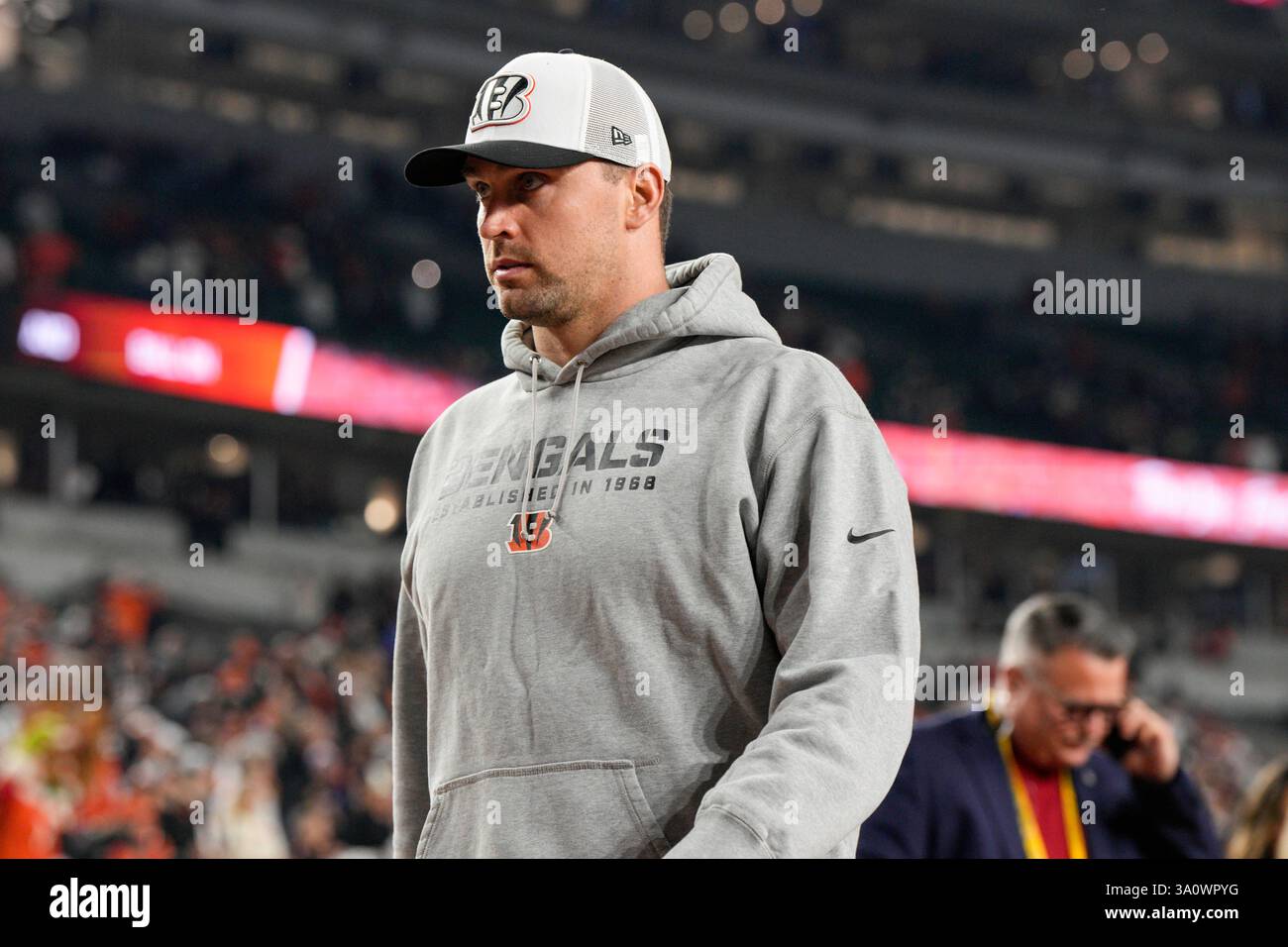 FILE - Cincinnati Bengals defensive end Sam Hubbard walks off the field ...