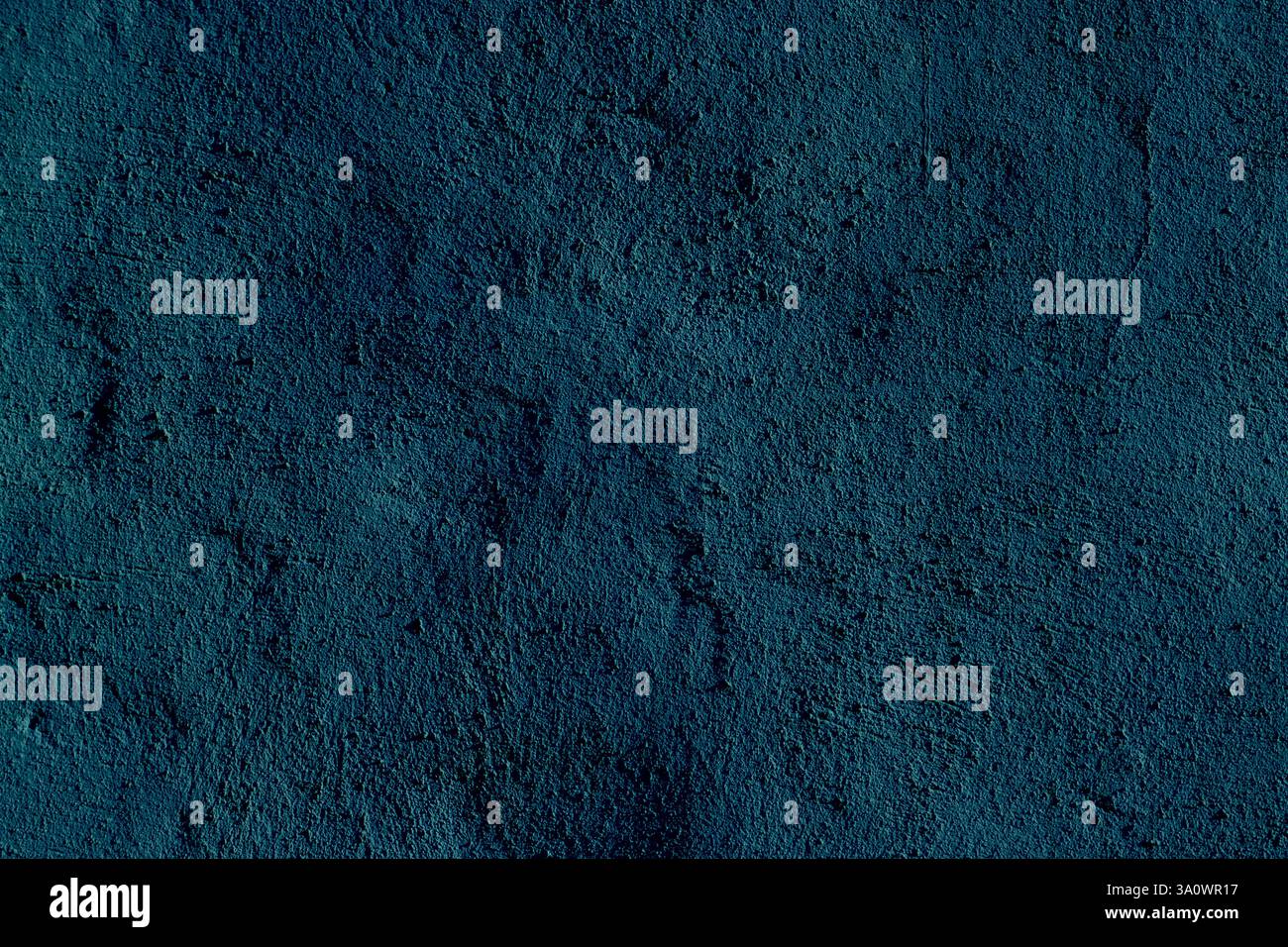 A rugged textured wall background in teal color, exhibiting a rough and ...