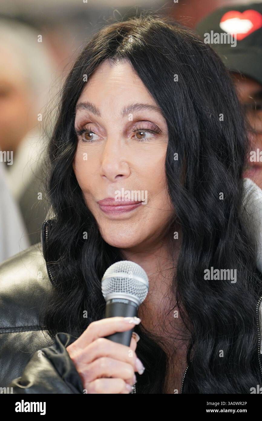 Cher at a public appearance for Cher Visits God s Love We Deliver ...