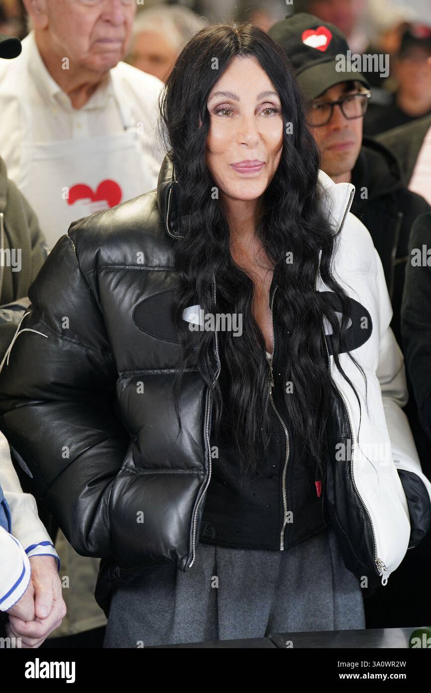 Cher at a public appearance for Cher Visits God s Love We Deliver ...