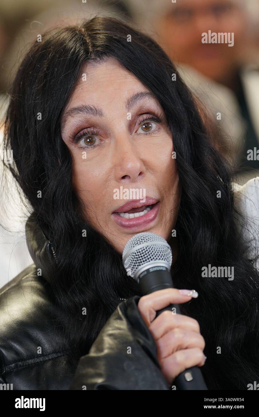 Cher at a public appearance for Cher Visits God s Love We Deliver ...
