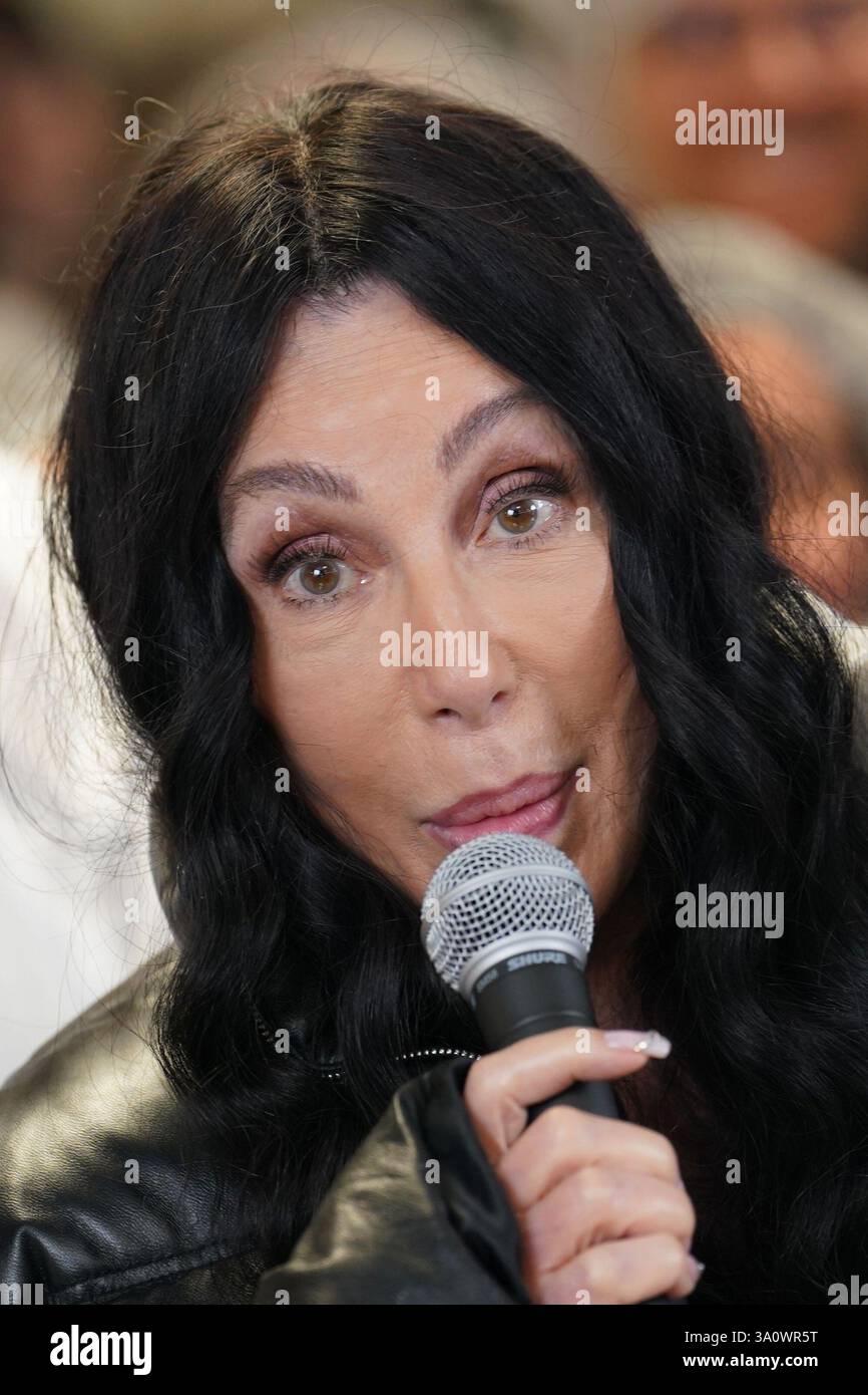 Cher at a public appearance for Cher Visits God s Love We Deliver ...