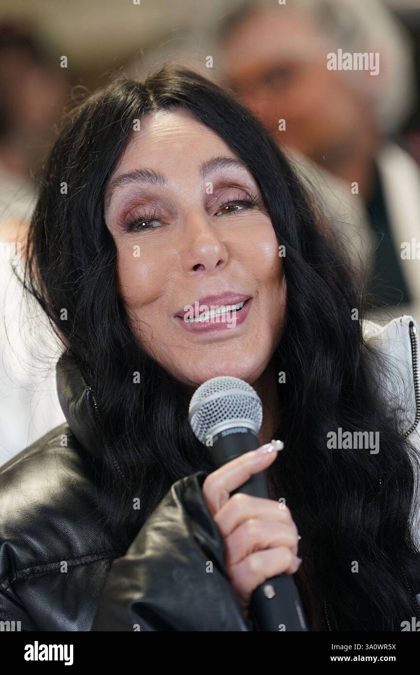 Cher at a public appearance for Cher Visits God s Love We Deliver ...