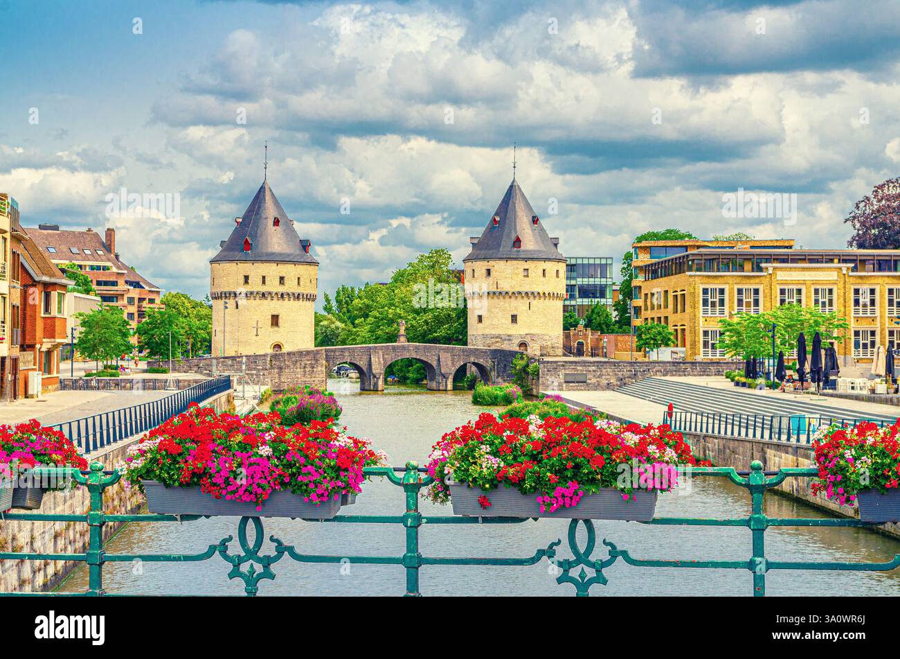 Kortrijk cityscape with Lys river, Broel Towers Gothic style buildings ...