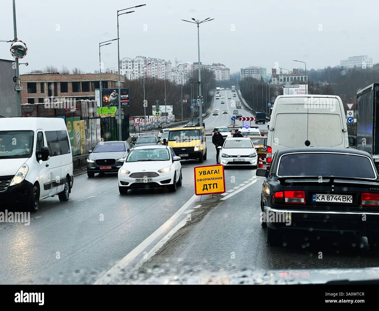 Kyiv, Ukraine - March 04, 2025: Urban road scene showing a traffic ...