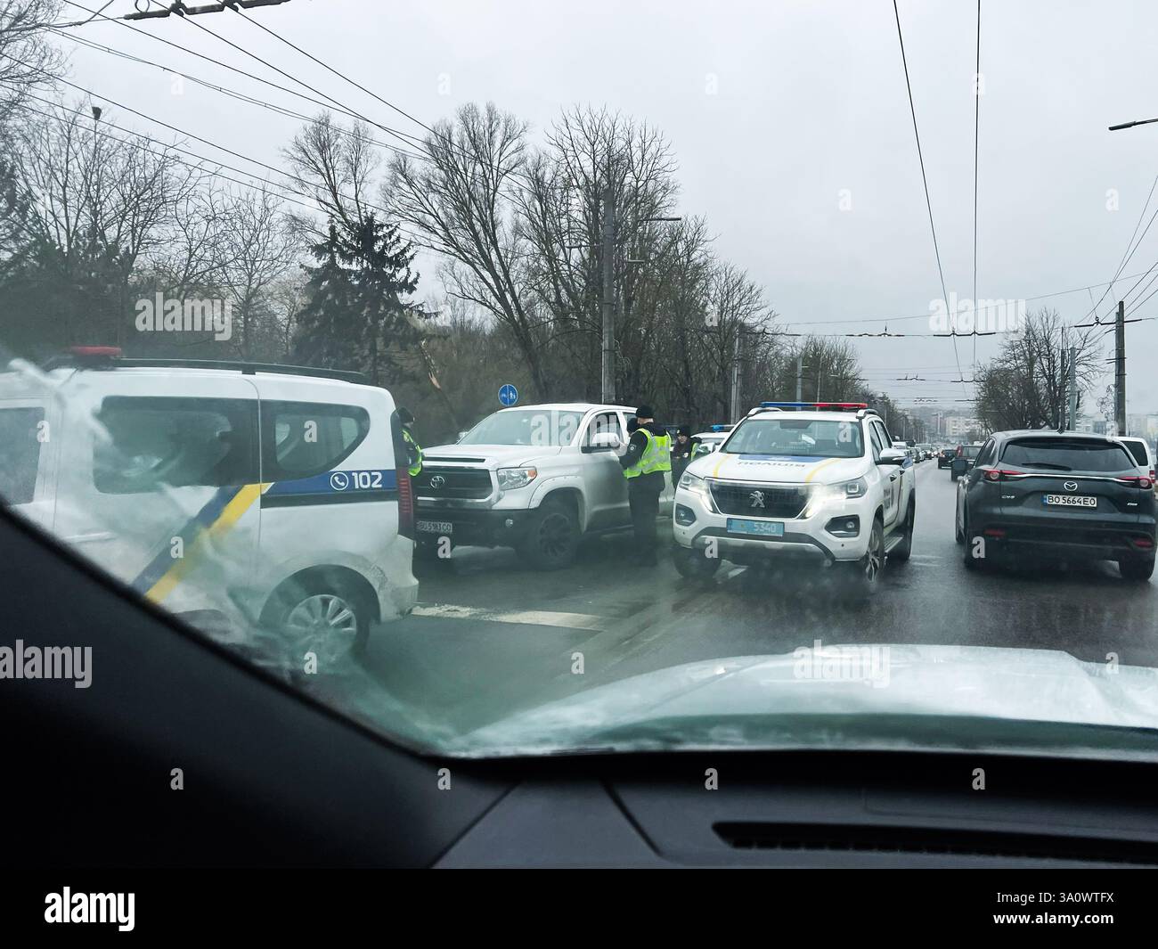 Kyiv, Ukraine - March 04, 2025: Police vehicles pursuit monitor a ...