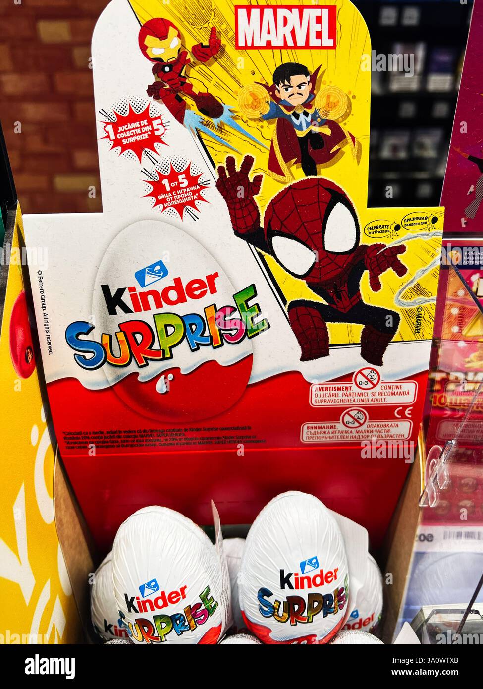 Kyiv, Ukraine - March 04, 2025: Superhero themed Kinder egg display ...