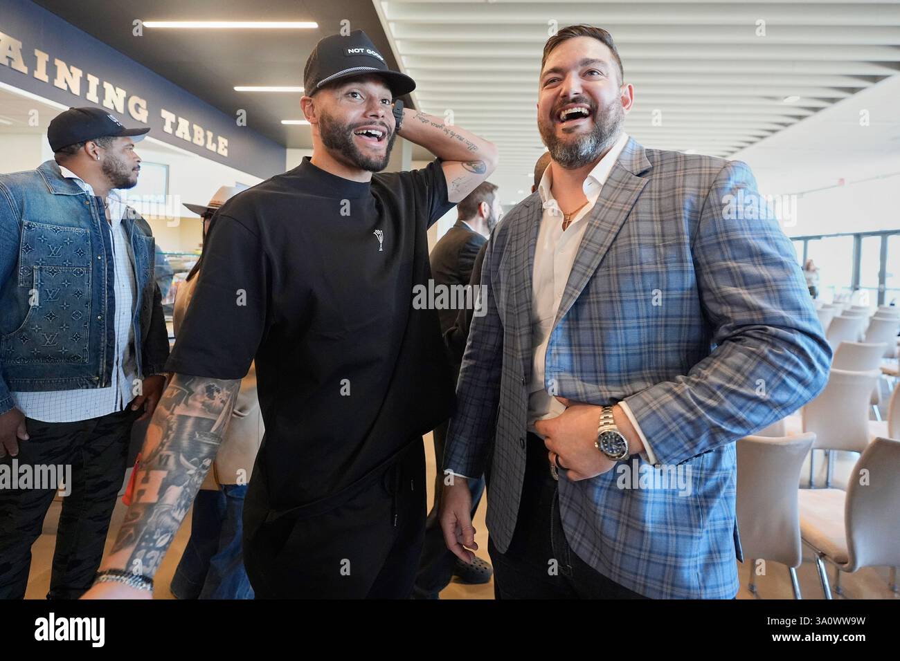 Dallas Cowboys quarterback Dak Prescott, left, and lineman Zach Martin ...