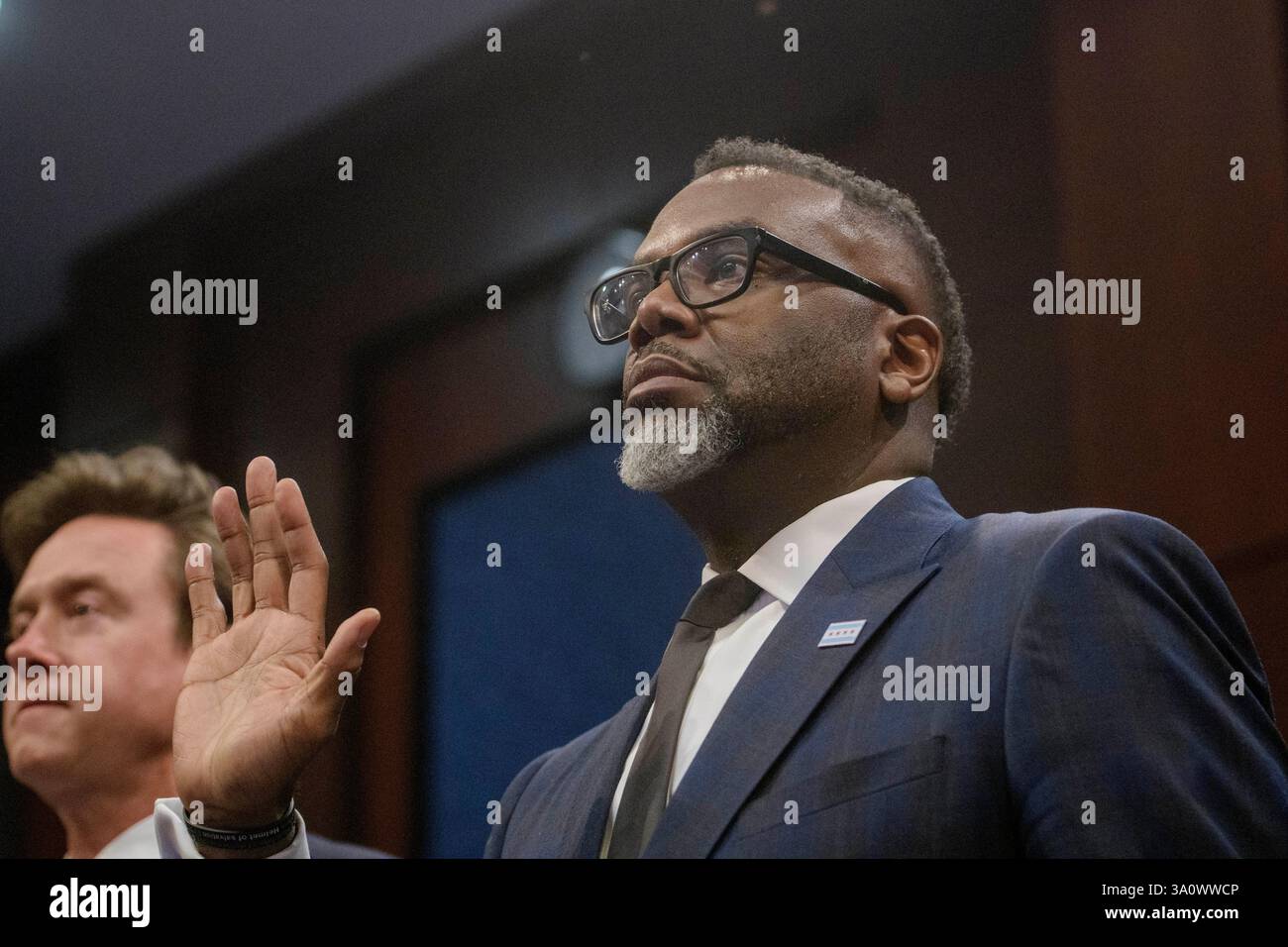 Chicago Mayor Brandon Johnson is sworn in during a House Committee on ...
