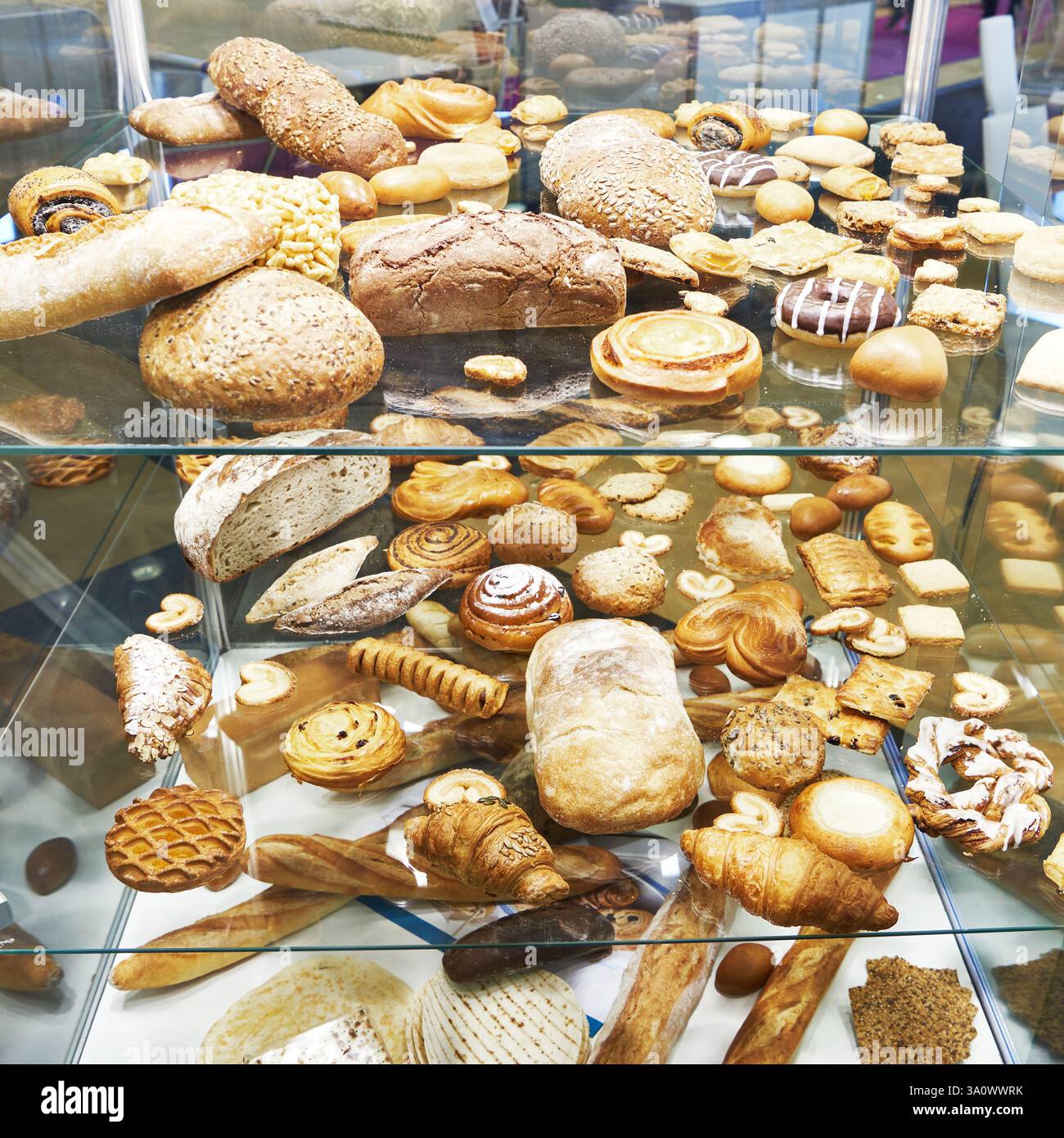 Fresh bread and pastries on shelves in a bakery Stock Photo - Alamy