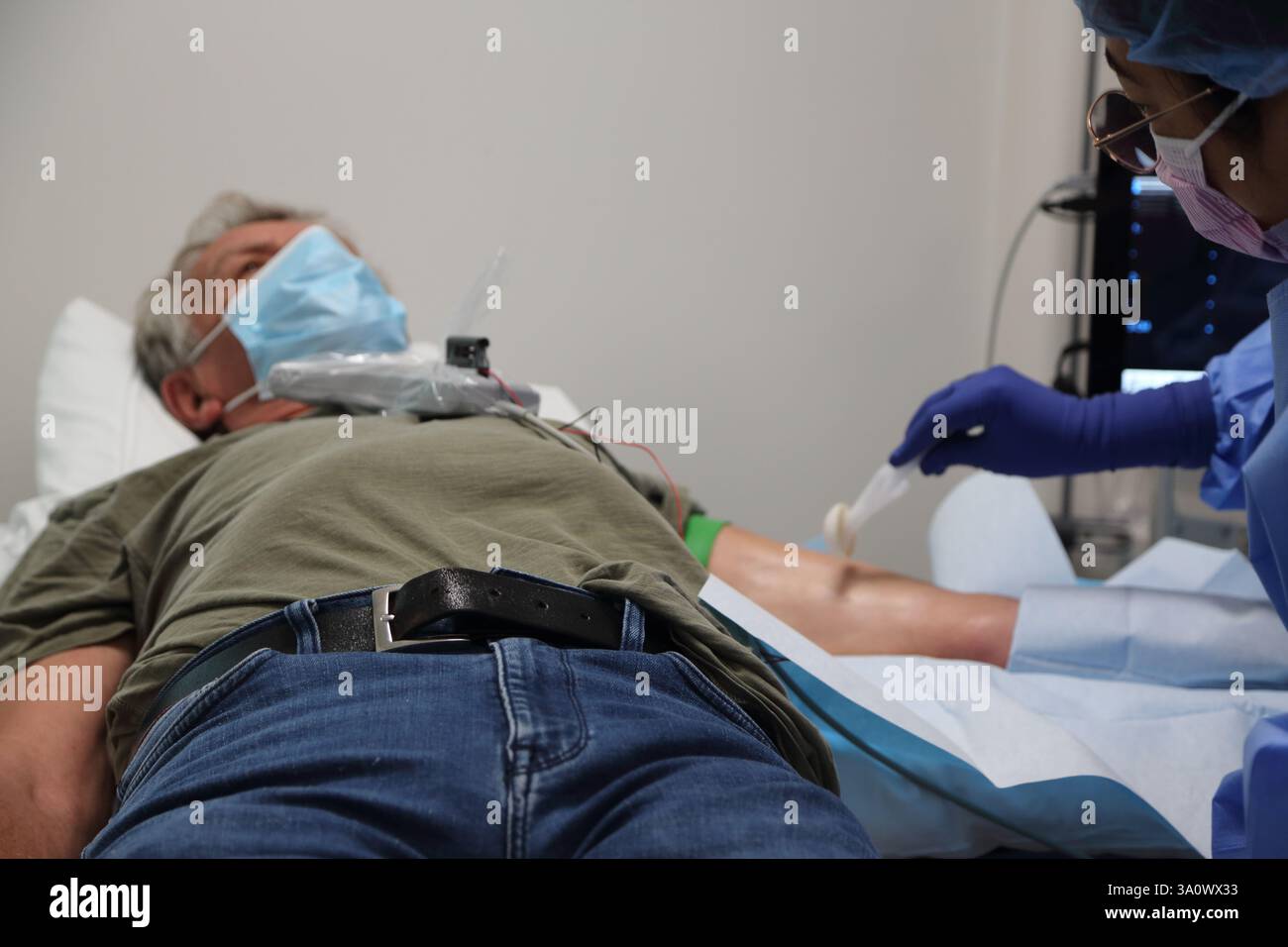Patient having having arrm swabbed before having Peripherally Inserted ...
