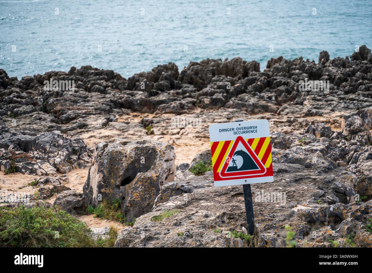 Close up of a danger sign, Overwash danger, unstable cliffs keep clear ...