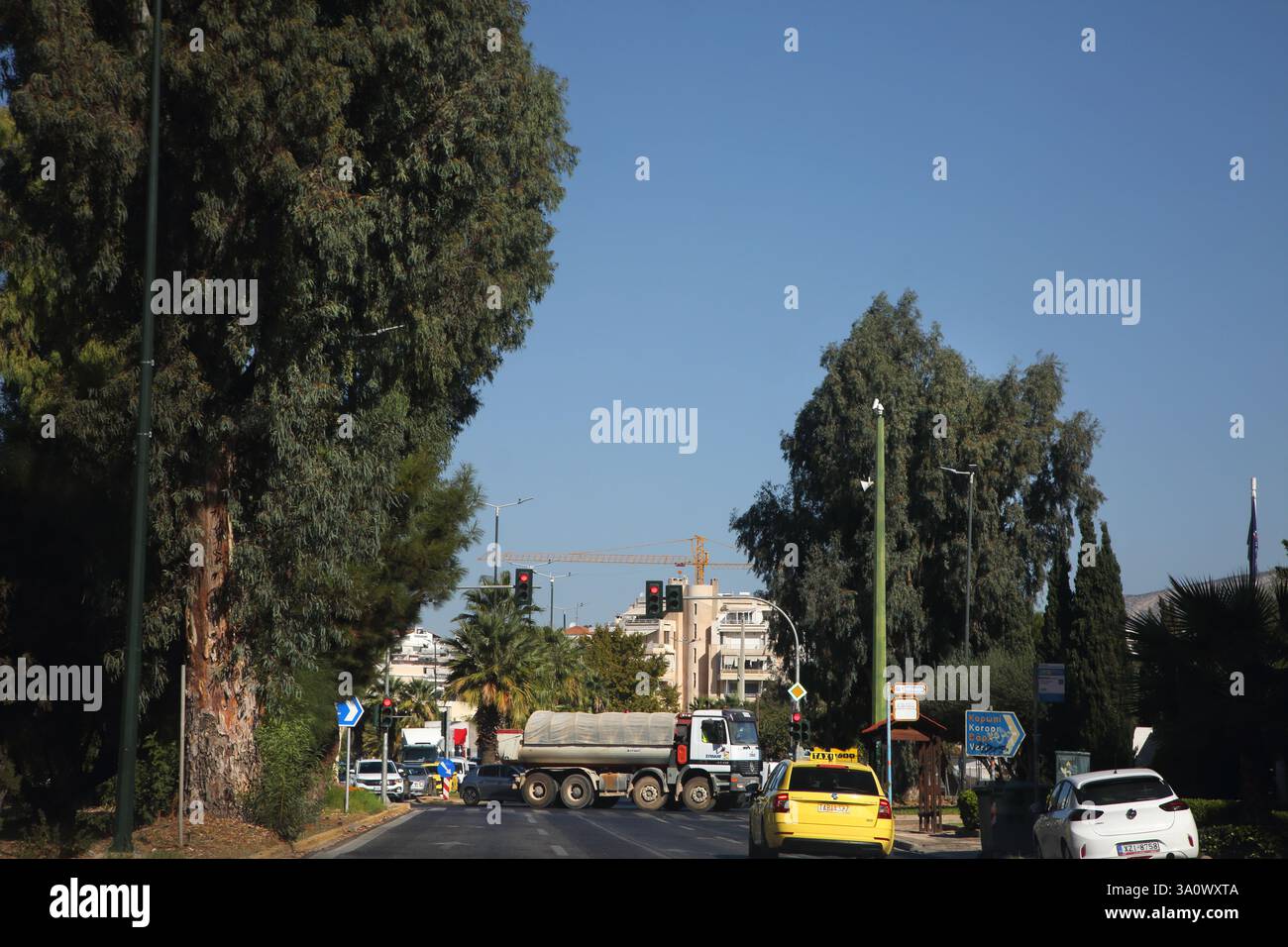 Lorry Crossing at Traffic Light on the road from voula to voulagmeni ...