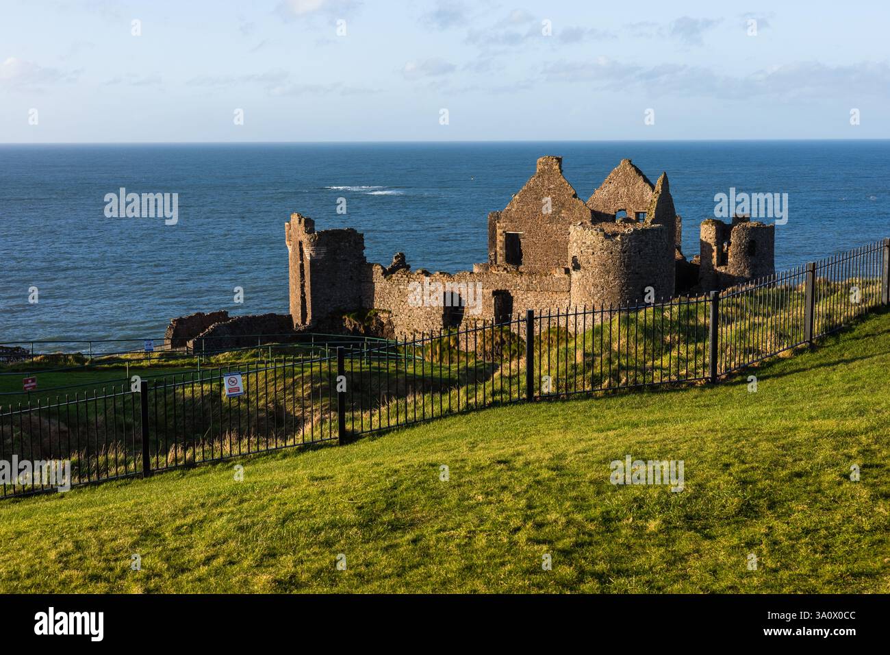Dunluce Castle coastline landscape picture Stock Photo - Alamy