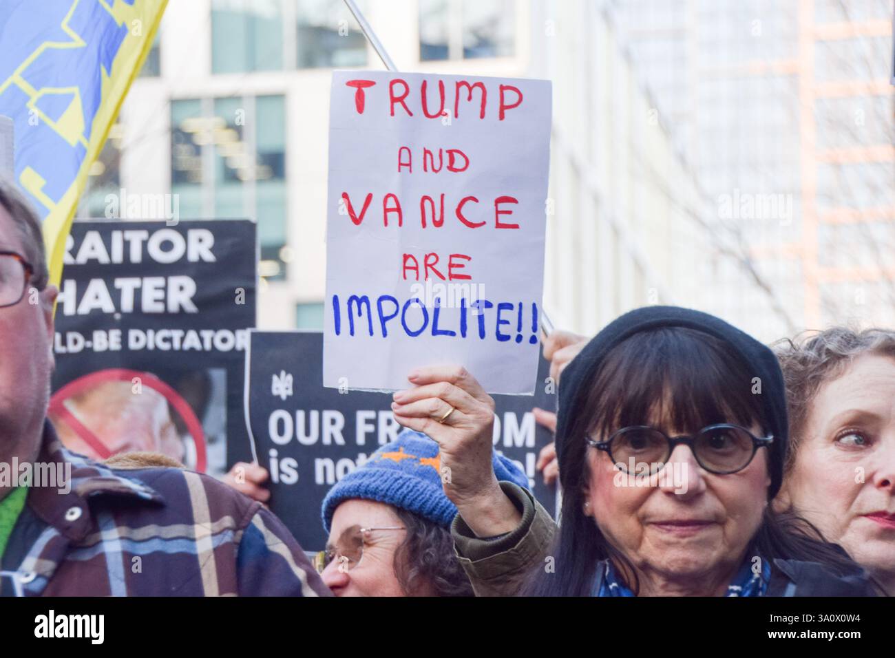 London, England, UK. 5th Mar, 2025. A protester holds a sign calling ...
