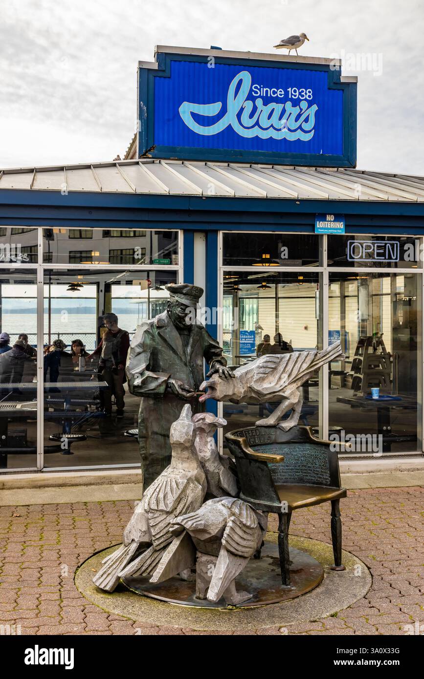 Statue of Ivar feeding gulls at Iconic Ivar's Acres of Clams along the ...