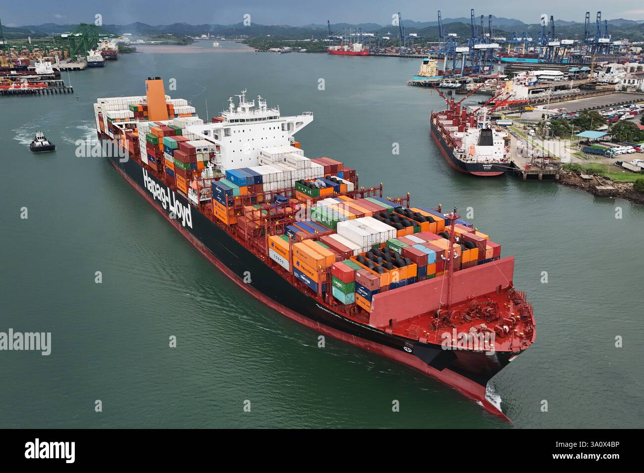 FILE - A cargo ship sails through the Panama Canal, in Panama City ...