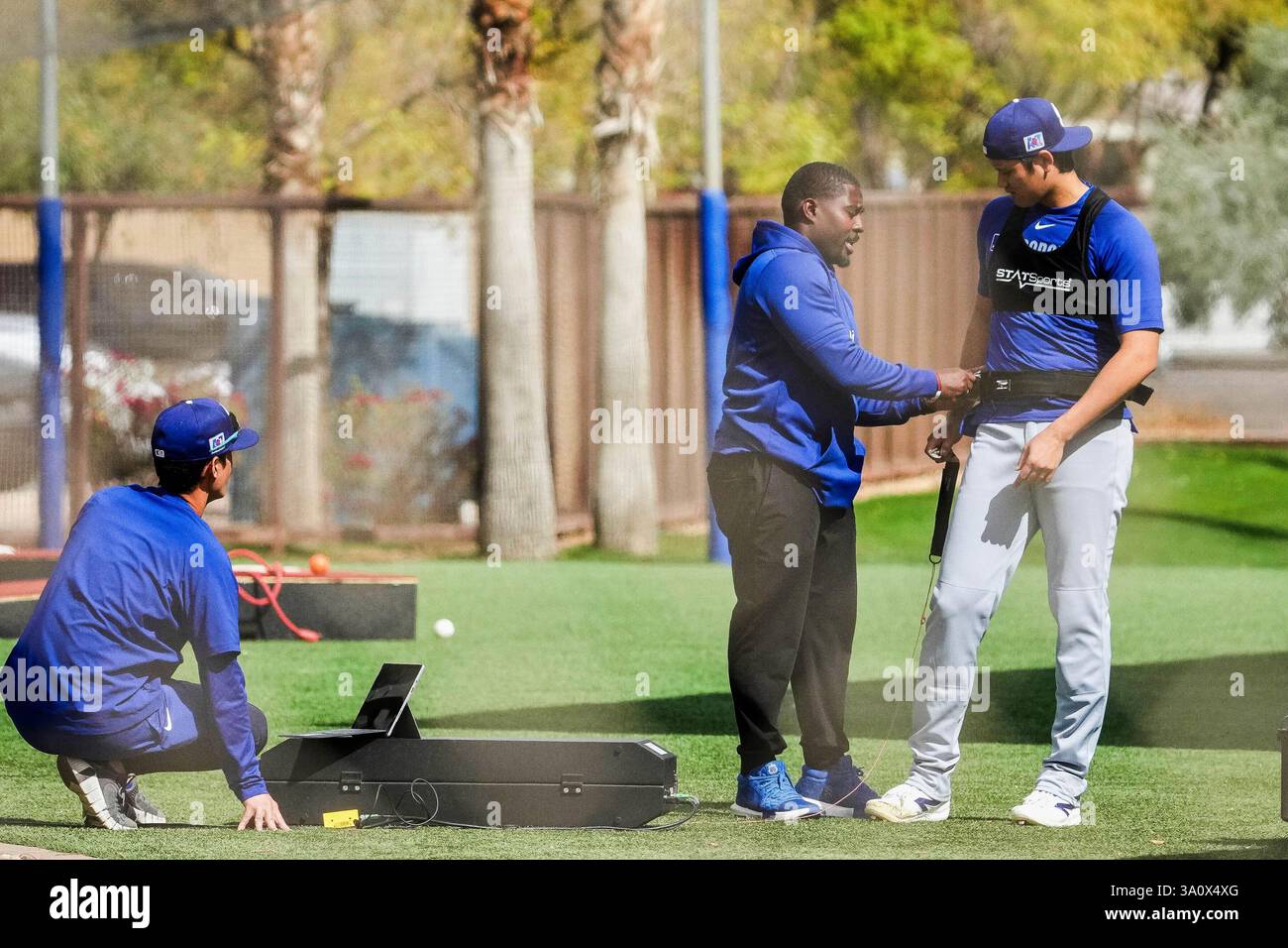 Los Angeles Dodgers strength and conditioning coach Travis Smith works ...