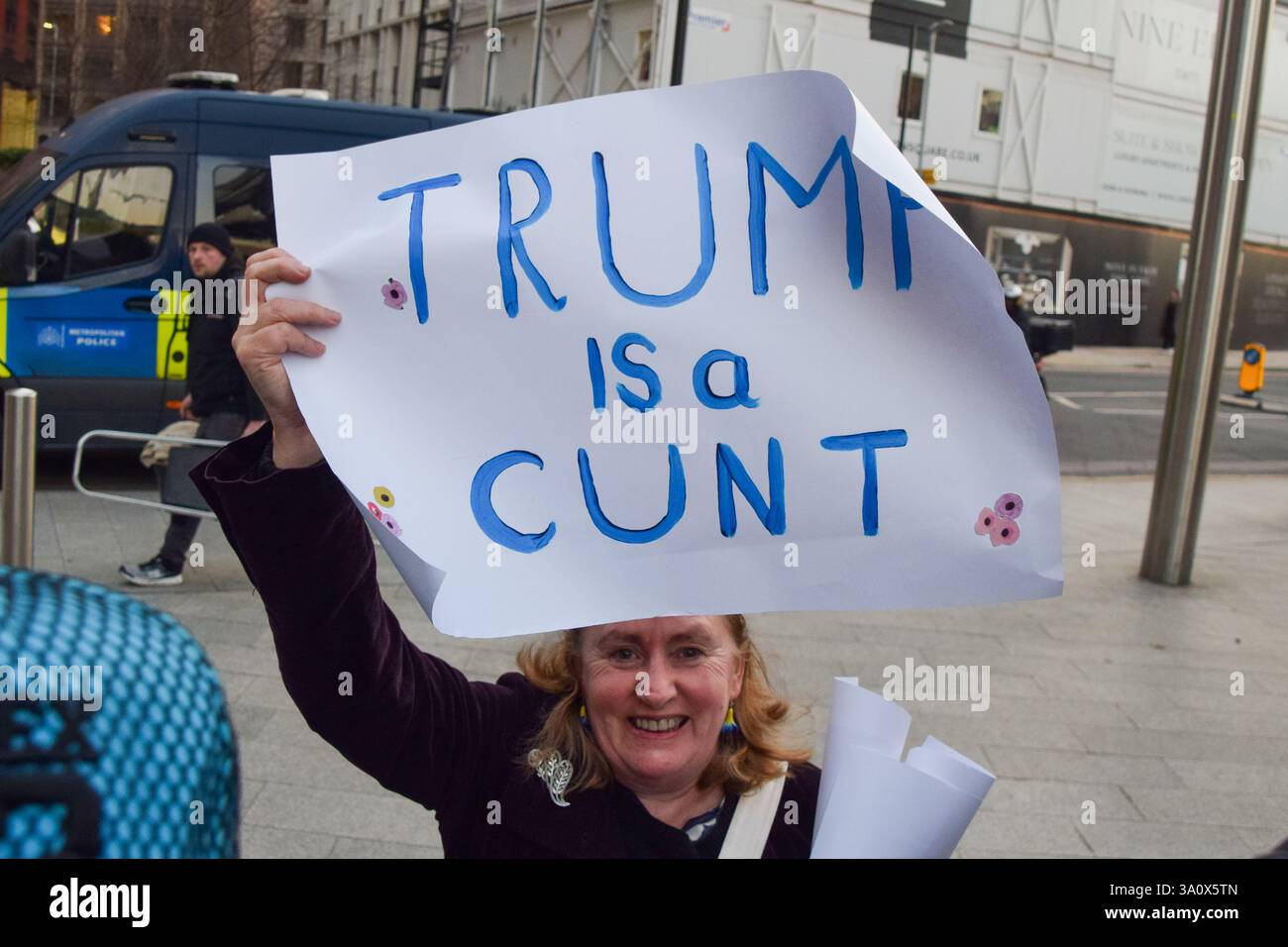 London, UK. 5th March 2025. A protester makes her feelings known about ...
