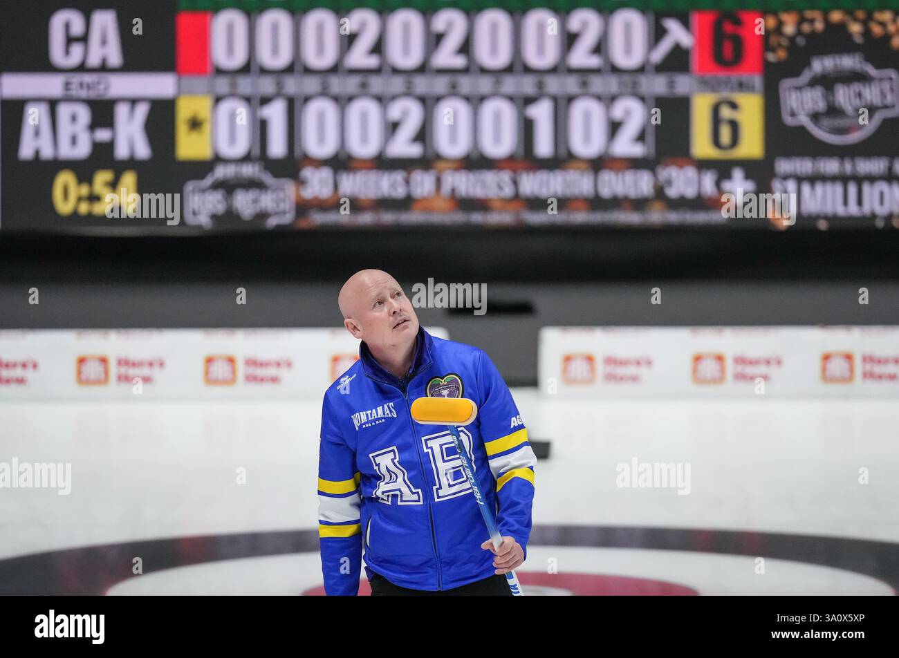 Kelowna, Canada. 05th Mar, 2025. Alberta-Koe skip Kevin Koe looks up at ...
