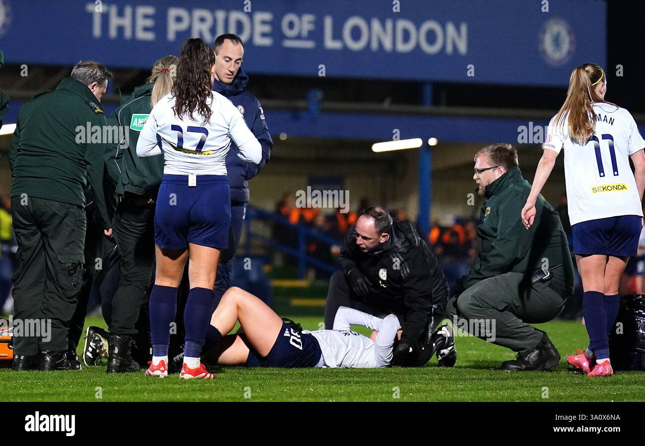Leicester City's Ruby Mace receives treatment following a challenge ...