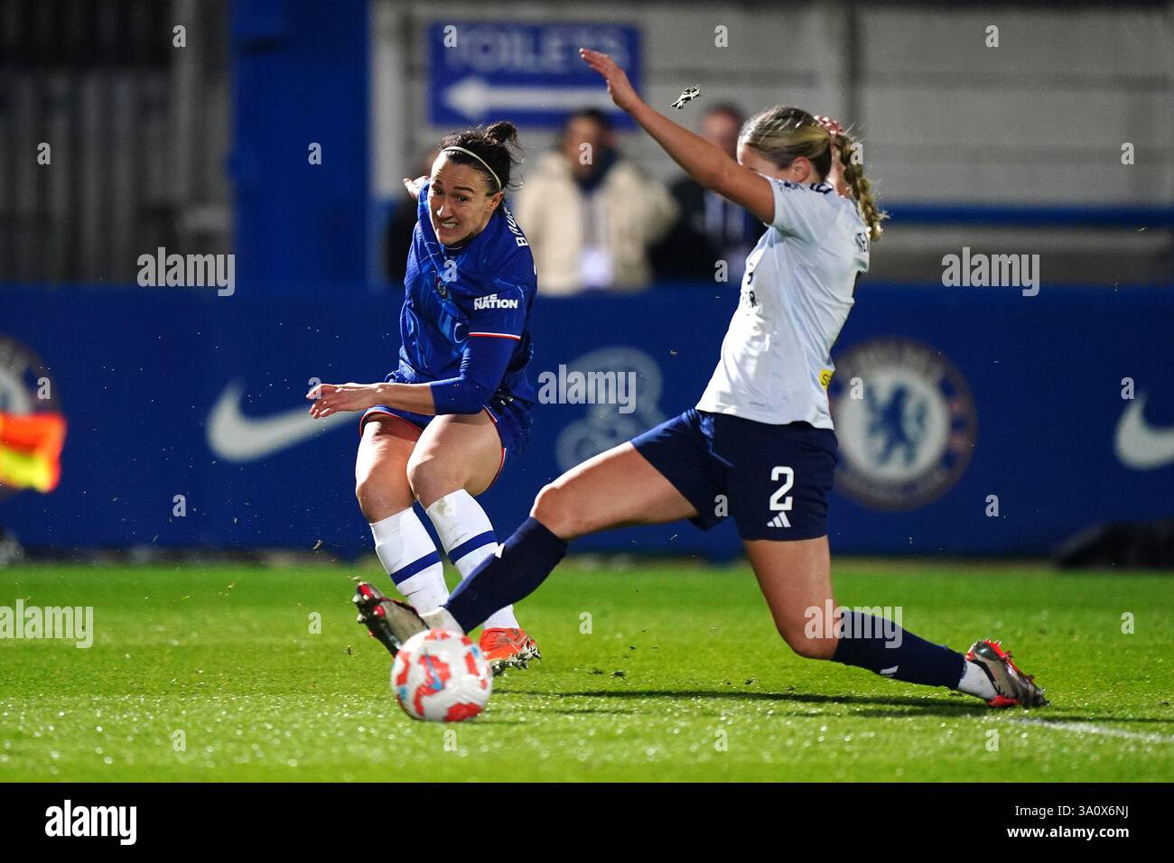 Chelsea's Lucy Bronze (left) and Leicester City's Courtney Nevin battle ...