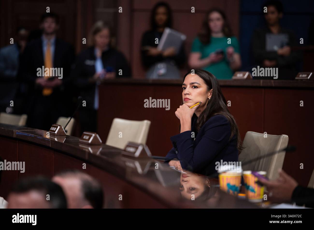 Rep. Alexandria Ocasio-Cortez (D-N.Y.) looks on during a House ...