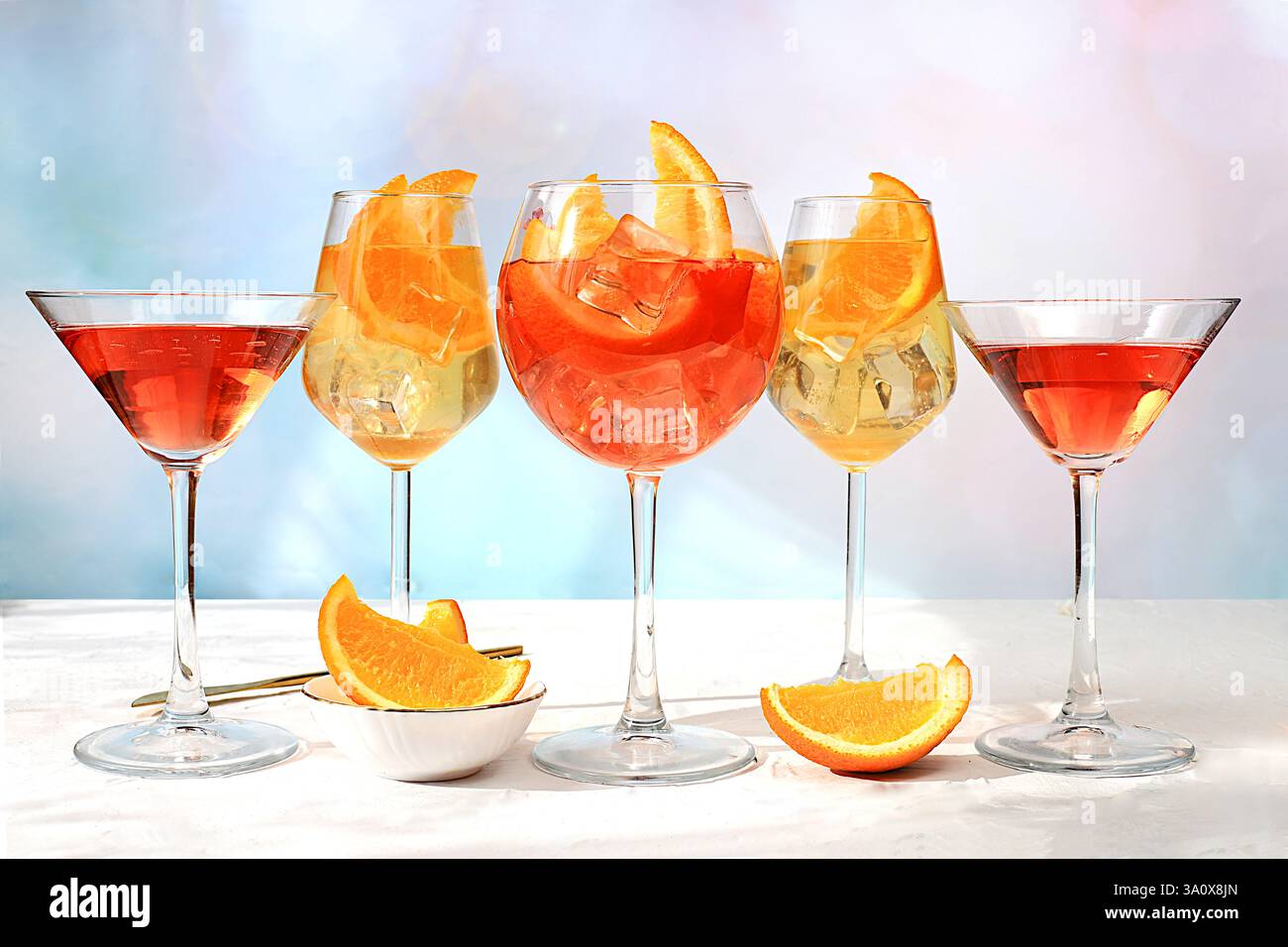 Festive alcoholic cocktail Aperol spritz, red Martini, tequila, rum ...