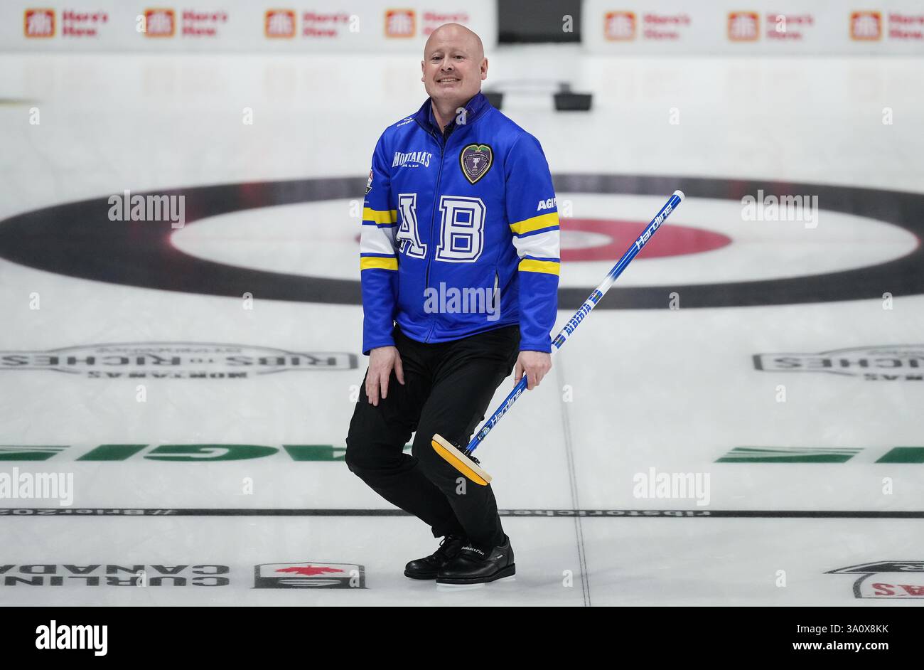 Alberta-Koe skip Kevin Koe reacts after missing a shot and losing in ...