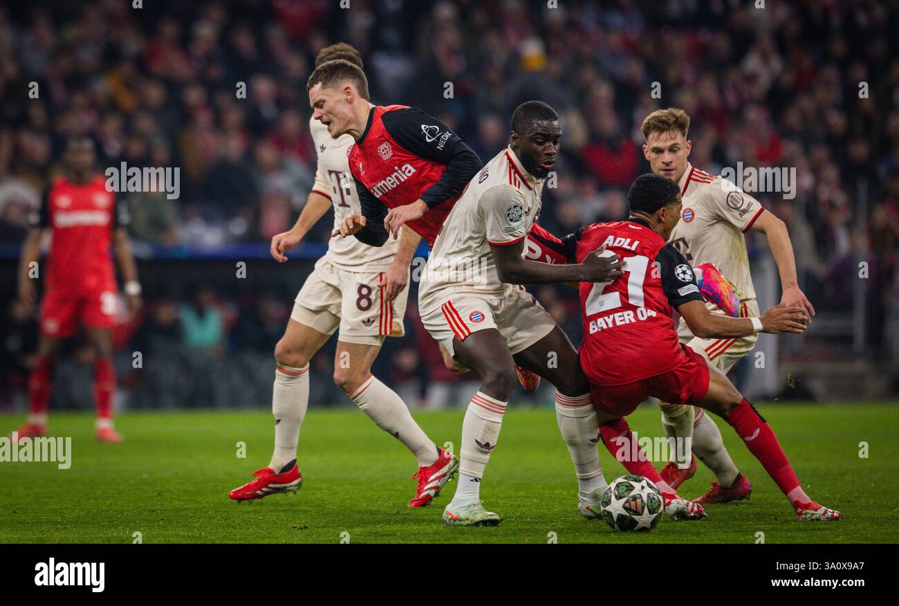Munich, Germany. 05th Mar 2025. Florian Wirtz (LEV) Dayot Upamecano (FCB) Amine Adli (LEV ...